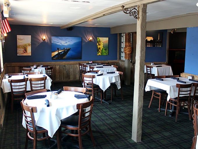 The nautical-themed dining room offers a cozy harbor from the elements, where white tablecloths signal that seafood is serious business here.