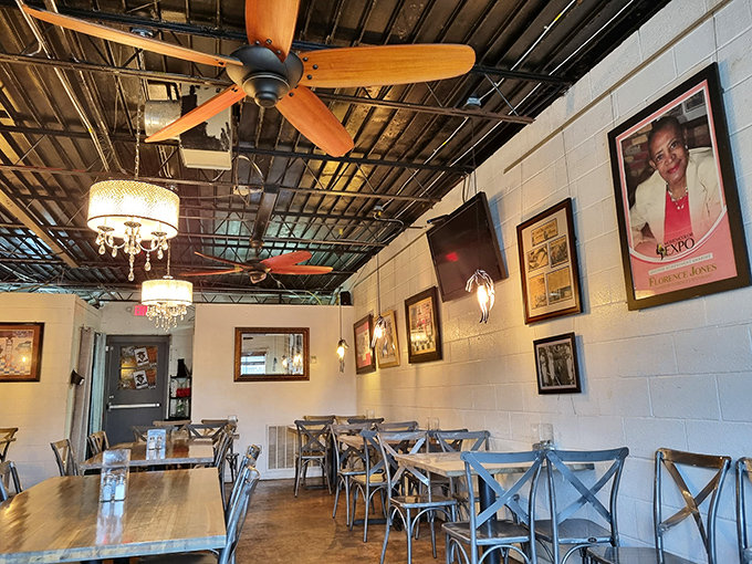 Crystal chandeliers meet exposed ceilings in this unpretentious dining room where comfort food gets the royal treatment it deserves.
