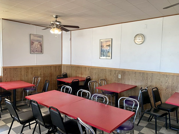 No-frills dining at its finest. Those red tables have witnessed countless first bites, food epiphanies, and the silent nods of burger satisfaction.