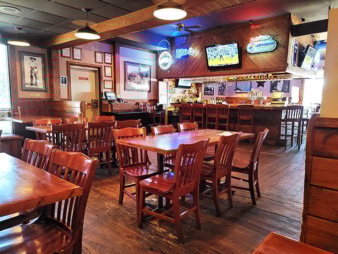 Wood-paneled warmth meets classic steakhouse charm. The kind of place where conversations flow as freely as the drinks, and every table feels like the best seat in the house.