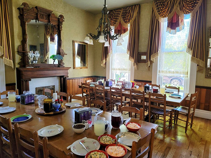 Time travel never tasted so good! Monell's Victorian-era dining room, with antique woodwork and family-style tables, sets the stage for memory-making meals.