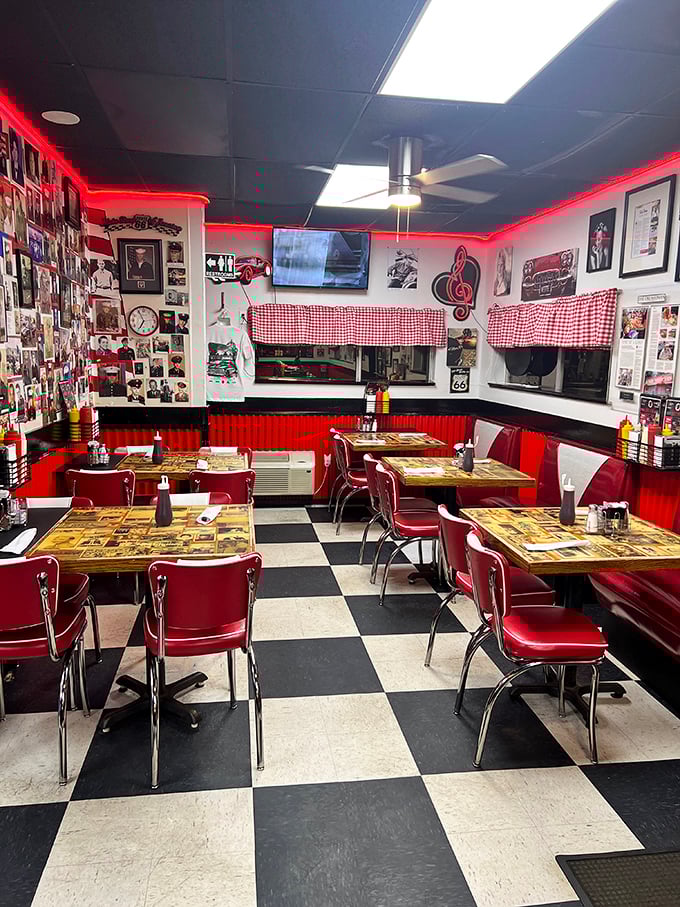 Classic Americana in every detail: red vinyl booths, checkered floors, and walls that tell stories. This isn't decoration&mdash;it's a living museum of community.