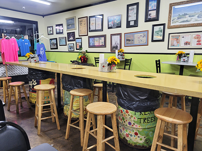 Inside Bozo's, history lines the walls while colorful barrels support wooden counters. This isn't interior design&mdash;it's decades of authentic coastal living.