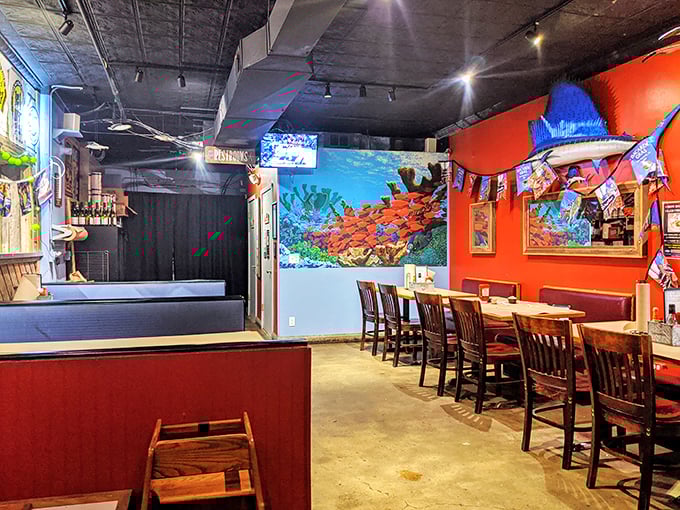 Inside, vibrant orange walls and marine-themed art create the perfect backdrop for seafood adventures. It's like the ocean decided to vacation in Nebraska.