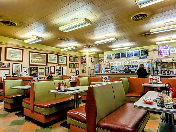 These mint green and orange vinyl booths have witnessed more breakfast epiphanies than a Sunday morning sermon. Classic diner perfection!