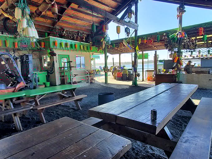 Rustic wooden beams, hanging buoys, and picnic tables that have witnessed thousands of crab-cracking victories. No white tablecloths needed when the view's this good.