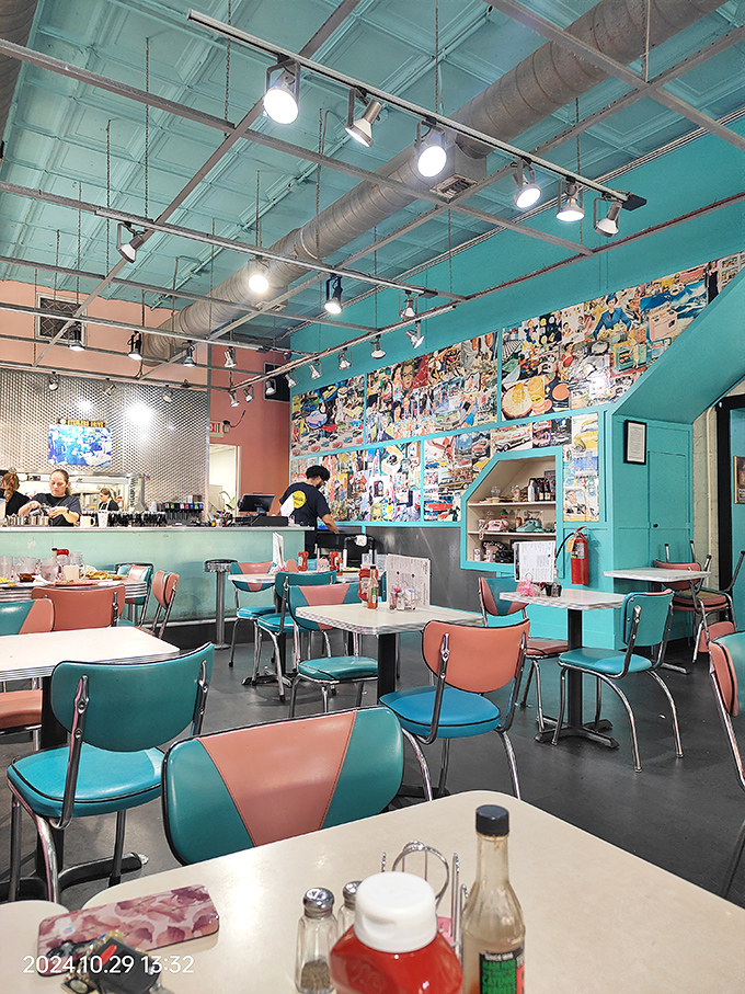 Retro turquoise and coral chairs transport you to a time when breakfast was sacred and calories were just cheerful little numbers.