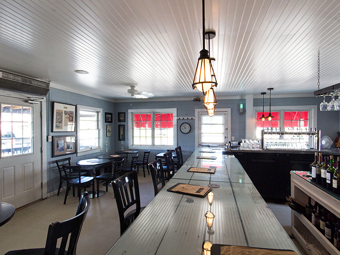 Inside, nautical blue walls and warm wood create the perfect seafood sanctuary. It's like dining in a stylish fisherman's cottage where every table feels like the captain's table.