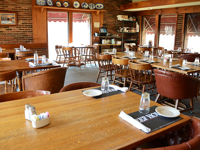 Wooden tables, captain's chairs, and brick walls create the perfect no-nonsense backdrop for serious steak business. Comfort trumps pretension every time.