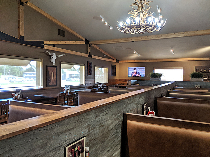 Wooden booths and an antler chandelier create the perfect backdrop for meat-based memories. This isn't designer decor&mdash;it's authentic steakhouse atmosphere that money can't manufacture.