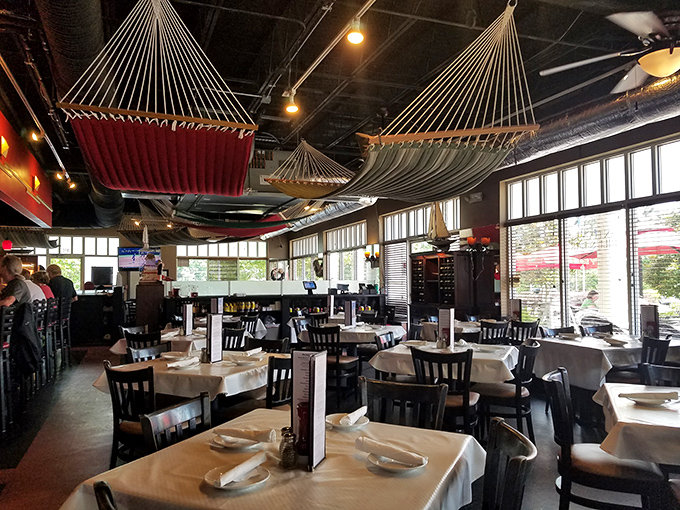 Hammocks suspended from the ceiling create a whimsical nautical atmosphere that makes you feel like you've sailed straight to New England.