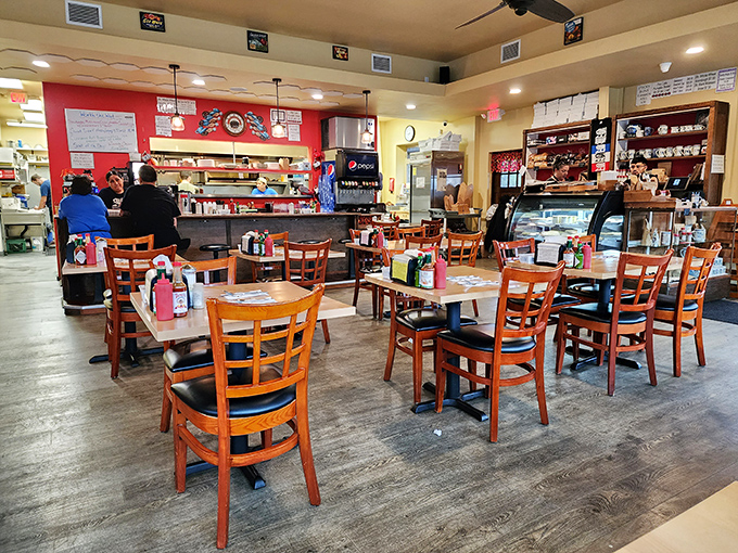 Wooden chairs, warm lighting, and a display case of temptations &ndash; the interior of Otis Cafe feels like the dining room of that cool grandma who actually knows how to cook.