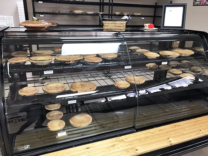Pie paradise awaits behind this glass display case. Like a museum of edible art, each creation sits patiently waiting for its forever home.