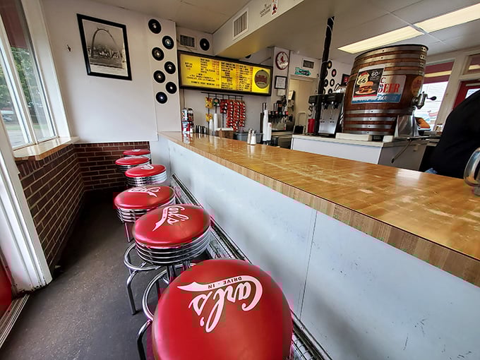 Time travel costs just the price of a burger at Carl's, where these red counter stools have supported decades of happy diners.