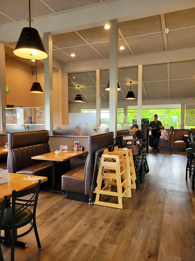 Cozy booths and warm wood tones invite you to slide in and stay awhile. This isn't trendy industrial chic—it's the restaurant equivalent of a firm handshake.