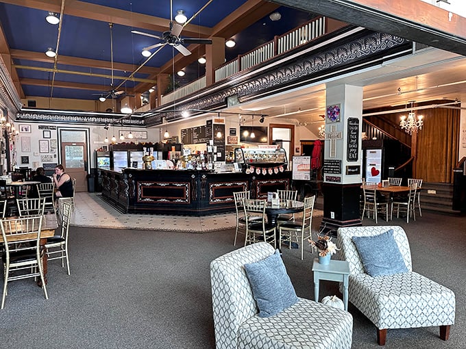 Step inside and discover a space that feels both elegant and homey, where blue ceilings and comfortable seating invite you to linger over dessert. 