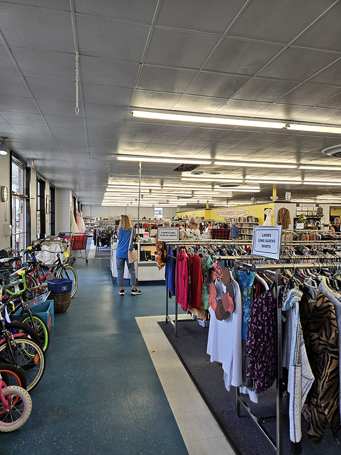 Organized chaos at its finest! Color-coded clothing racks and clear signage make this thrift hunt less "Where's Waldo?" and more "Found it!"