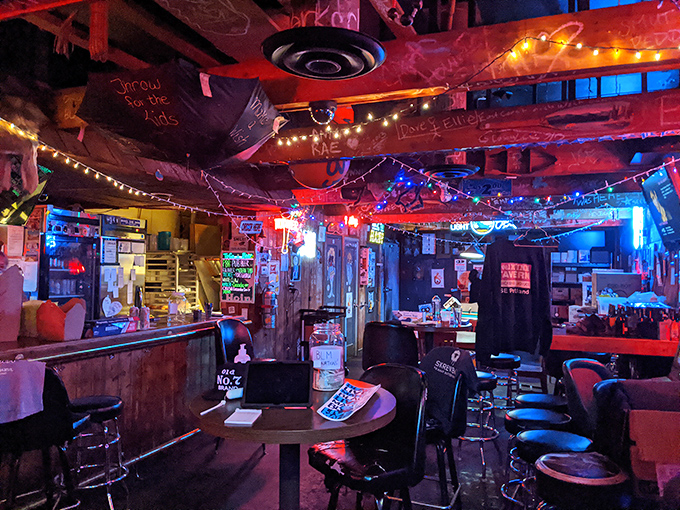 Christmas lights twinkle year-round in this wood-paneled wonderland where graffiti-covered beams tell stories of good times past and chicken-fueled revelry.