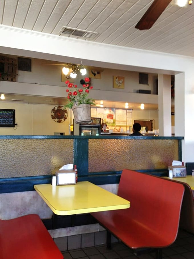 Classic red booths and yellow tables create that perfect nostalgic diner atmosphere. This isn't Instagram-bait decor&mdash;it's the real deal comfort zone.