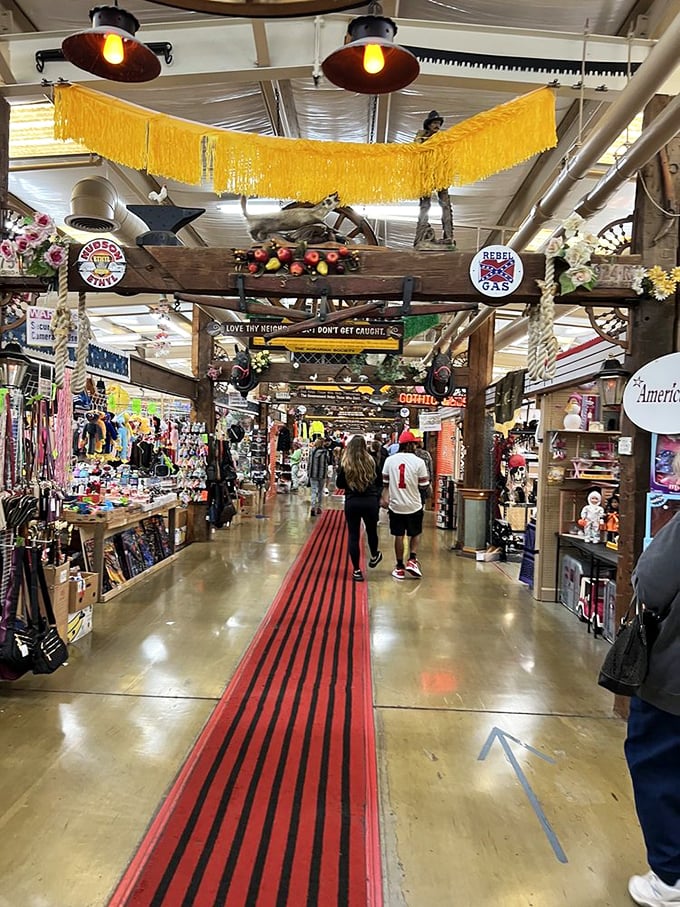 Follow the red-striped carpet through this treasure-seeker's paradise, where vintage signs and yellow fringe create the ambiance of a carnival for collectors.