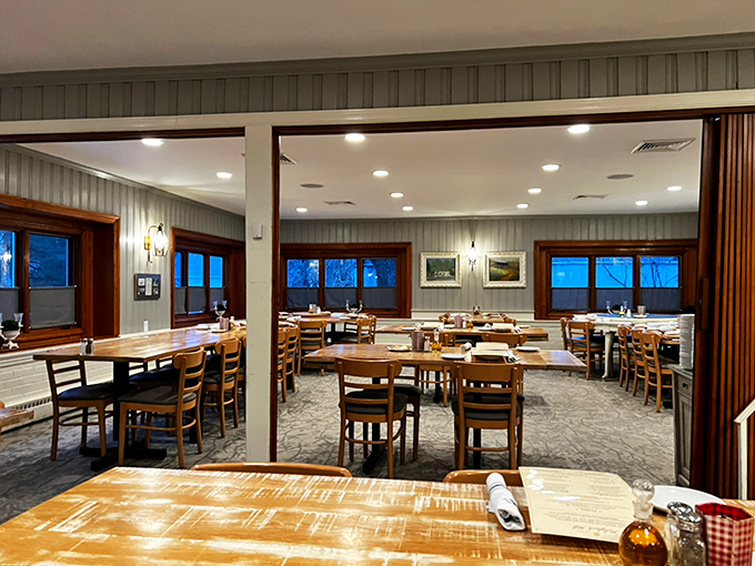 Simple wooden tables and soft lighting create the perfect backdrop for culinary magic. No pretension here, just the promise of comfort.