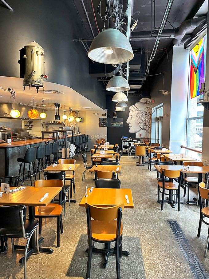 Industrial chic meets comfort in this thoughtfully designed space, where the Liberty head mural watches over diners like a patron saint of perfect poached eggs.