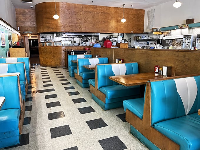 Those mint-green booths aren't just seating&mdash;they're time machines that have witnessed decades of Jackson's morning conversations and coffee refills. 