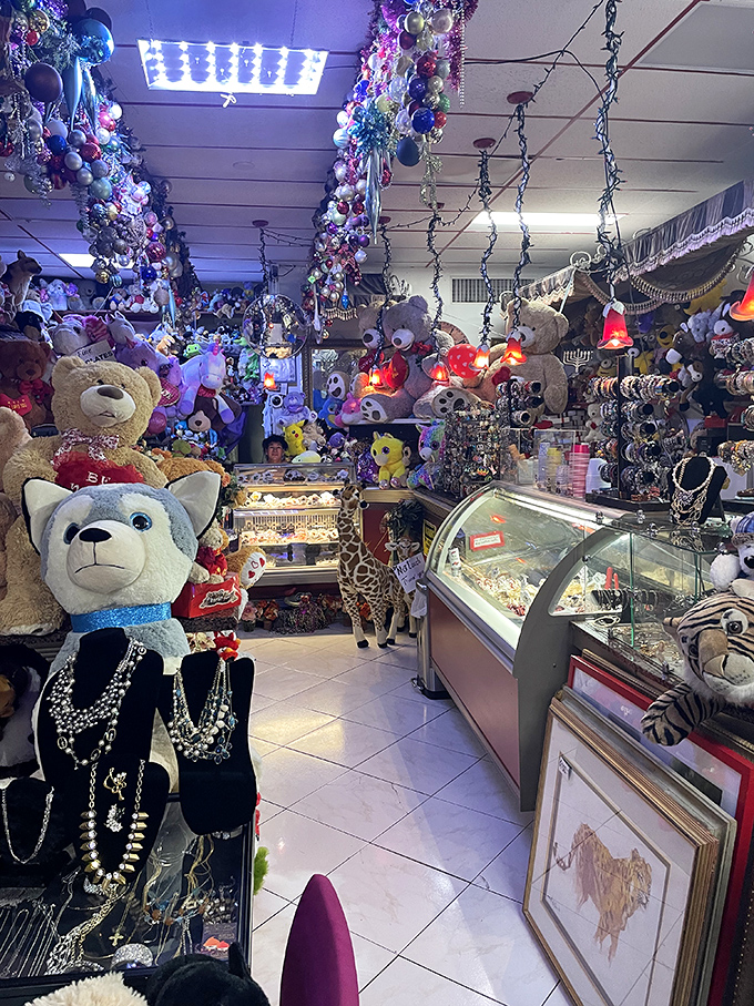 Somewhere between a candy shop and Narnia's attic, teddy bears dangle from the ceiling while jewelry-adorned plushies stand watch over chocolate treasures below.