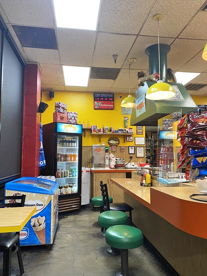 Yellow walls and green stools create the perfect backdrop for hot dog epiphanies. This isn't just dining&mdash;it's time travel to simpler days.
