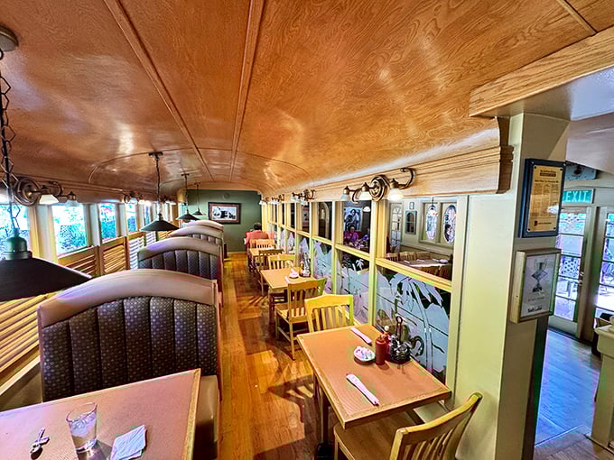 Step inside a piece of Salt Lake City history. The converted trolley car interior offers warm wood tones and cozy booths that practically whisper "stay awhile."