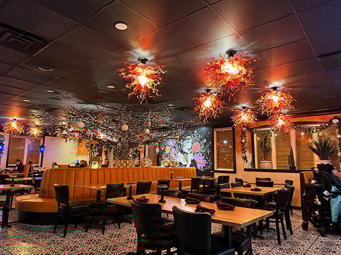 Those fiery glass chandeliers aren't just for show&mdash;they're a promise of the heat to come. Comfortable booths and warm lighting create the perfect atmosphere for serious food appreciation.