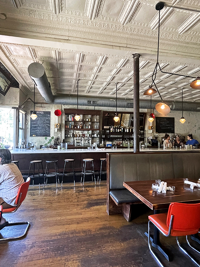 Tin ceilings, pendant lights, and wooden floors create that perfect "I've discovered somewhere special" feeling that makes brunch memories last.