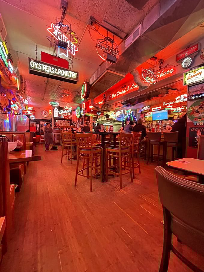 Where neon dreams and burger schemes come to life. The Turf Club's interior is a glowing testament to decades of good times.