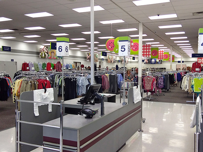 Organized chaos at its finest! Color-coded sections and numbered aisles make this thrift store feel like a department store's quirky cousin.