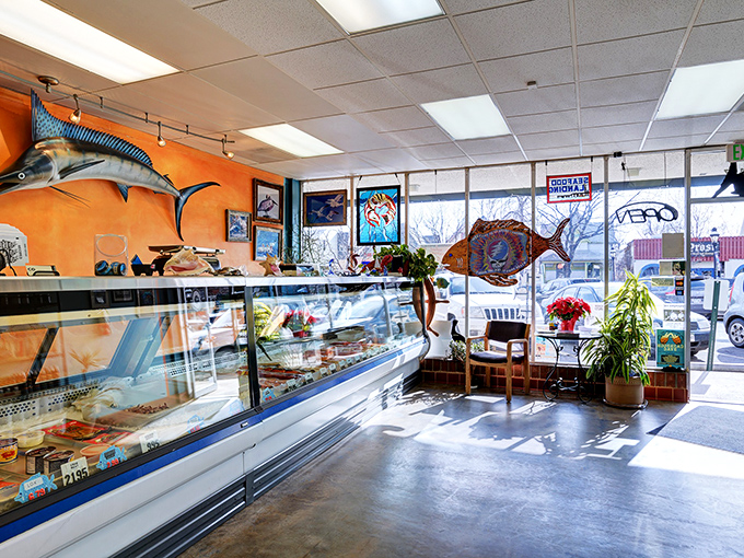 Bright orange walls and mounted fish create the perfect maritime atmosphere. It's like the ocean decided to vacation in Colorado.
