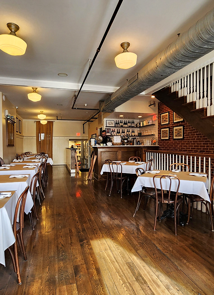 Warm wooden floors, crisp white tablecloths, and exposed brick walls create the perfect backdrop for seafood magic. Like Hemingway's prose &ndash; simple, elegant, and deeply satisfying. 