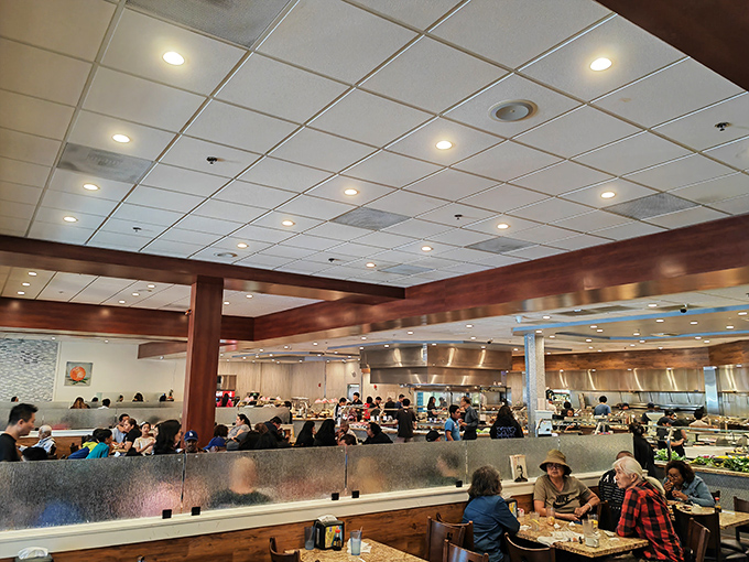 Inside Paradise Buffet, the warm wood accents and spacious layout aren't just design choices &ndash; they're strategic preparation for your imminent food journey.