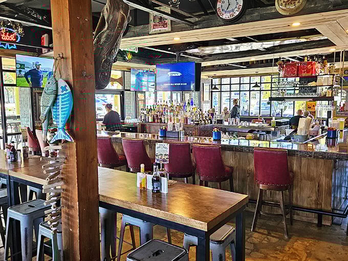 Pull up a burgundy bar stool and settle in. This rustic-meets-maritime interior feels like the perfect place to swap fishing tales over cold beer.