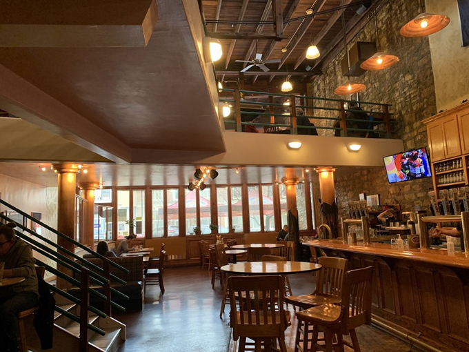 Inside, exposed brick walls and wooden beams create that perfect "third place" atmosphere&mdash;not home, not work, just right.