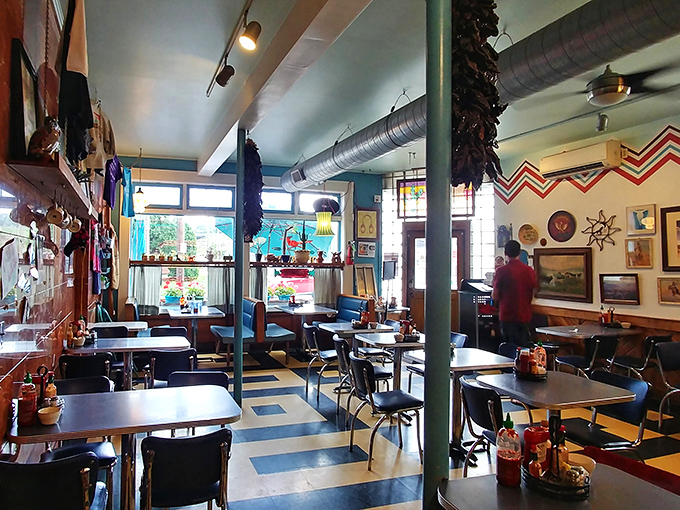 Inside, zigzag patterns dance across walls while checkered floors and retro tables create that perfect "where have you been all my life" diner atmosphere.