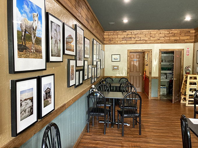 Local photography adorns walls where conversations flow as freely as the coffee, creating that rare atmosphere where everyone feels like a regular.