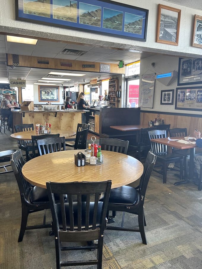 Classic diner charm with wooden paneling and simple furnishings—where conversations flow as freely as the coffee.