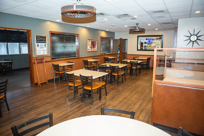 Classic diner ambiance with a touch of warmth&mdash;where conversations flow as freely as the coffee. No pretension, just breakfast perfection.