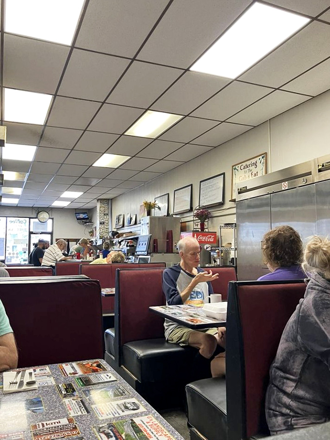 Classic diner booths where strangers become friends and coffee cups are never empty. The real Carnegie Hall of breakfast conversations. 