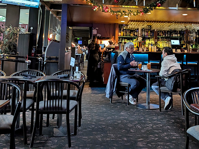 Cozy wood-paneled interiors create that perfect "neighborhood gem" atmosphere. The kind of place where memories are made between bites. 