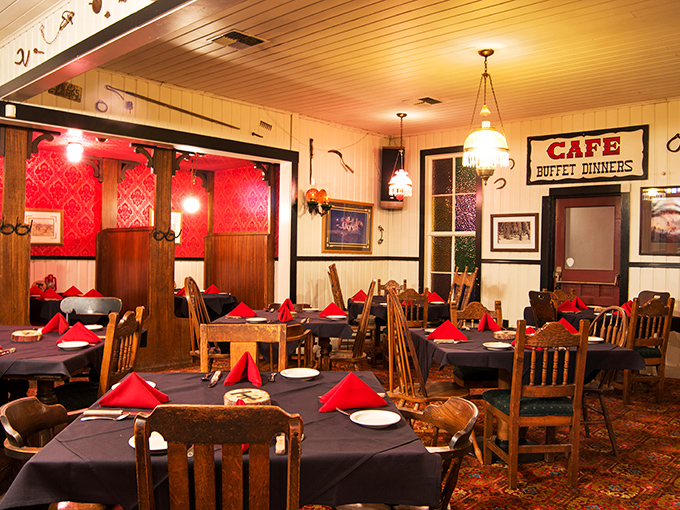 Step inside and time-travel to the Old West, where wooden beams, vintage lighting, and red accents create the perfect backdrop for serious steak contemplation.