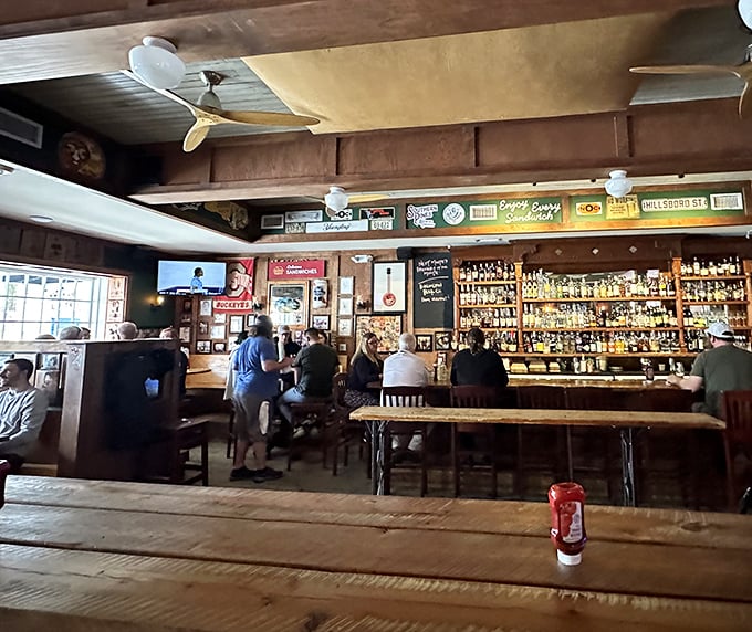 Inside, time slows down as the warm wooden interior and impressive bar create that magical atmosphere where strangers become friends over good drinks.