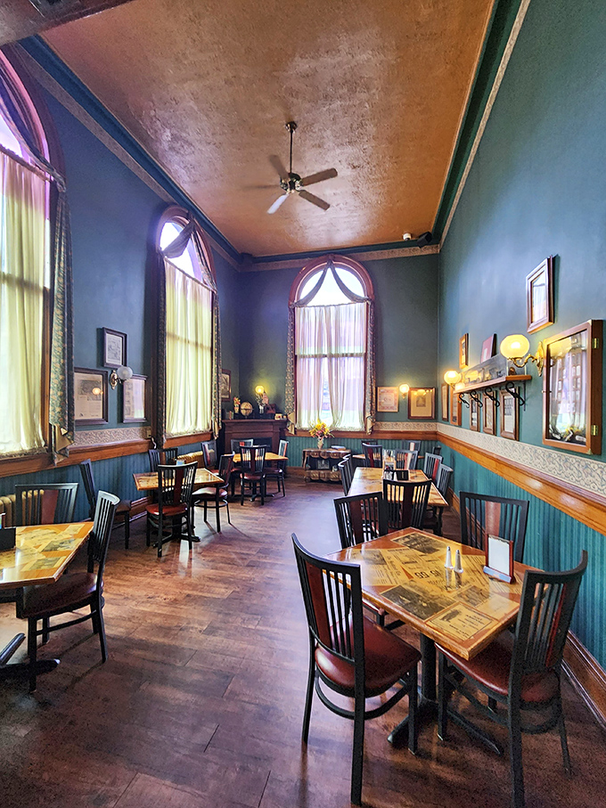 High ceilings, teal walls, and elegant woodwork create an atmosphere where Hemingway would happily devour a steak while penning his next masterpiece.