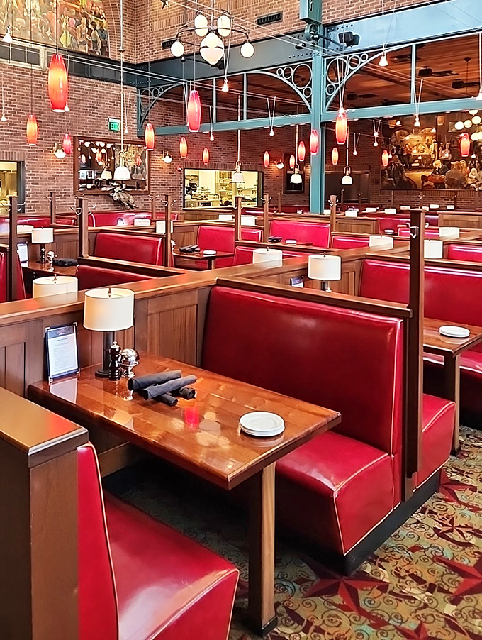 Red leather booths and warm lighting create the perfect backdrop for life's important questions, like "Should we order another round of appetizers?" (Spoiler: Yes.)