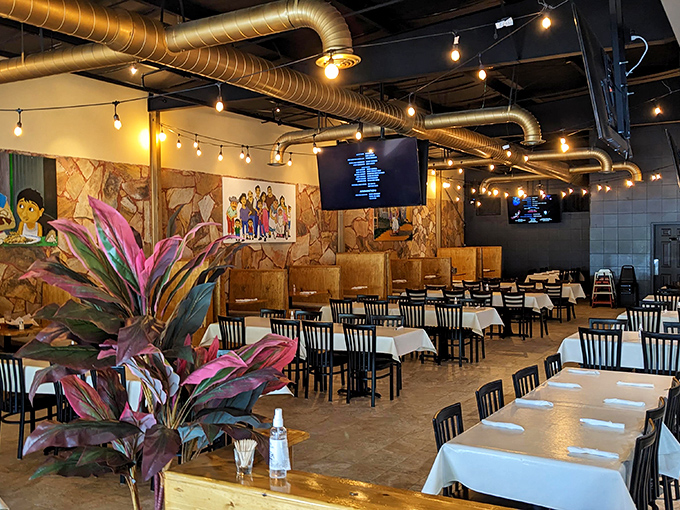 The interior strikes that perfect balance&mdash;rustic charm meets modern comfort. String lights overhead create the "is this a Tuesday or an occasion?" ambiance we all crave.